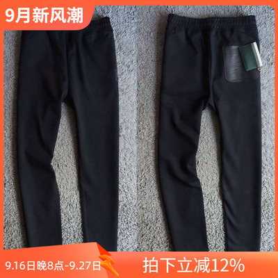 黑色弹力修身系绳休闲裤