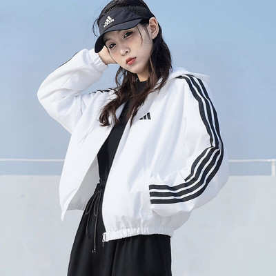 阿迪达斯白色梭织外套女装2026春季跑步训练运动服连帽夹克JZ2161