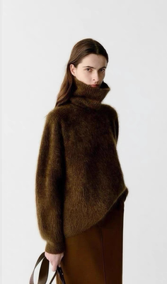 2025秋冬新款韩版宽松慵懒风设计感无缝一体羊毛针织衫软儒上衣