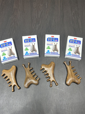 刮痧梳头部按摩穴位按压木梳