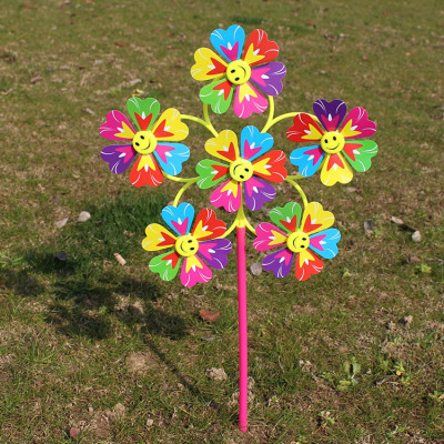 笑脸彩色幼儿园活动卡通风车