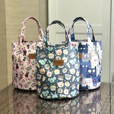 2026新款防水便当包上班手提饭盒包零食袋妈咪包圆筒包焖烧杯bao