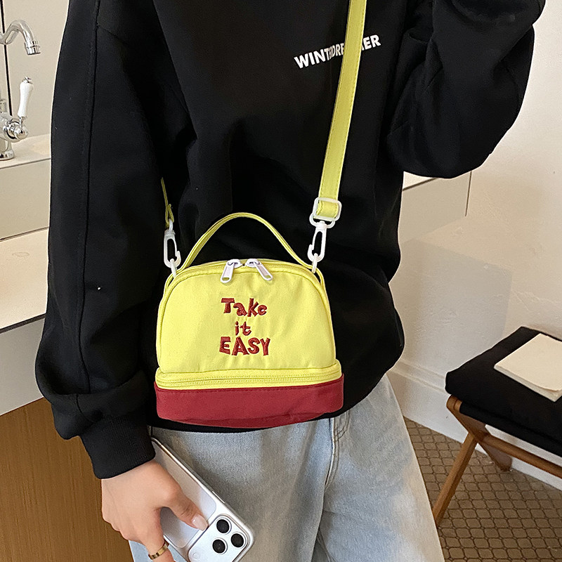 多巴胺撞色小包包女2026新款手提斜挎包百搭轻便休闲帆布包手机包