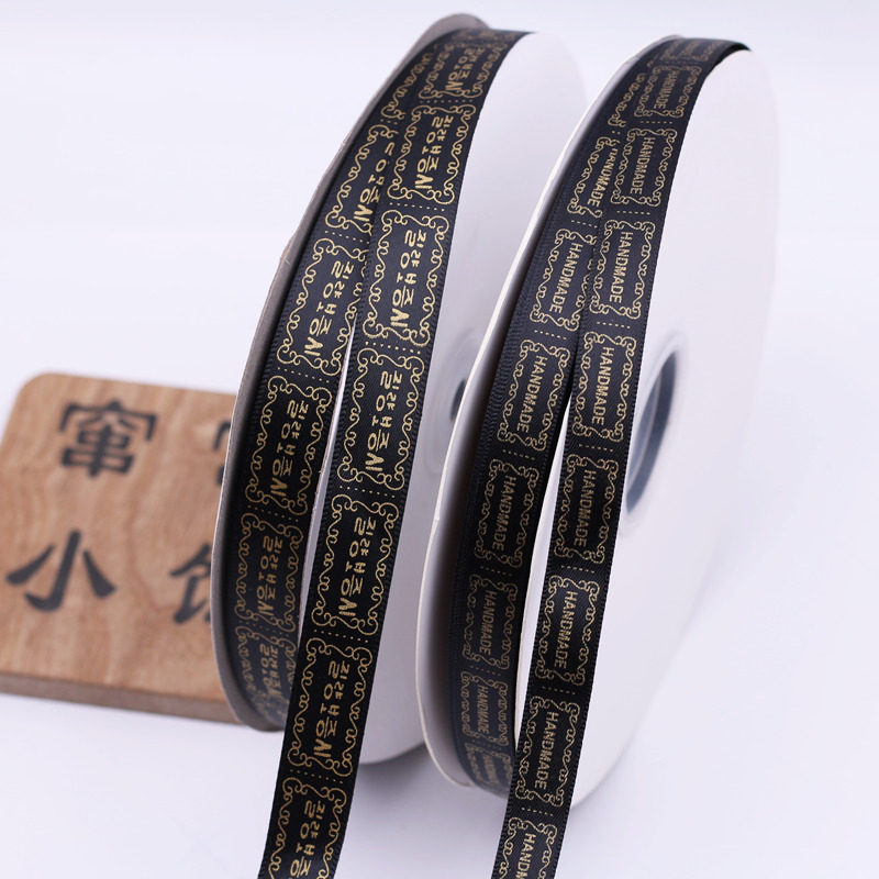 按卷100码1.5cm宽手工韩文印唛织唛diy发夹皮筋发饰固定标签布贴