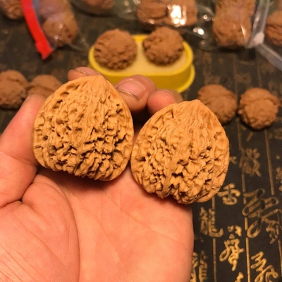 文玩核桃涿鹿南疆石狮子头高炮窝底十字尖蚂蚁纹盘玩手把件南将石