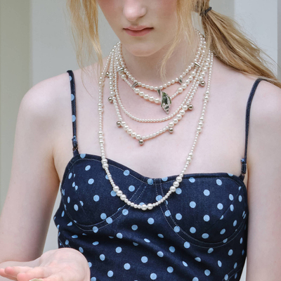 珍珠钛钢铆钉海螺层叠组合项链