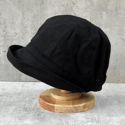 A thin, air-pumped cap with a sunlit hat on the side of a wo