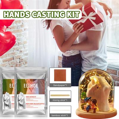 A couples hand-molding powder. A baby makes a 3-foot model