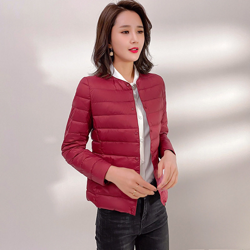 唯品会特卖断码清仓特价处理轻薄白鸭绒羽绒服女装品牌正品春秋冬