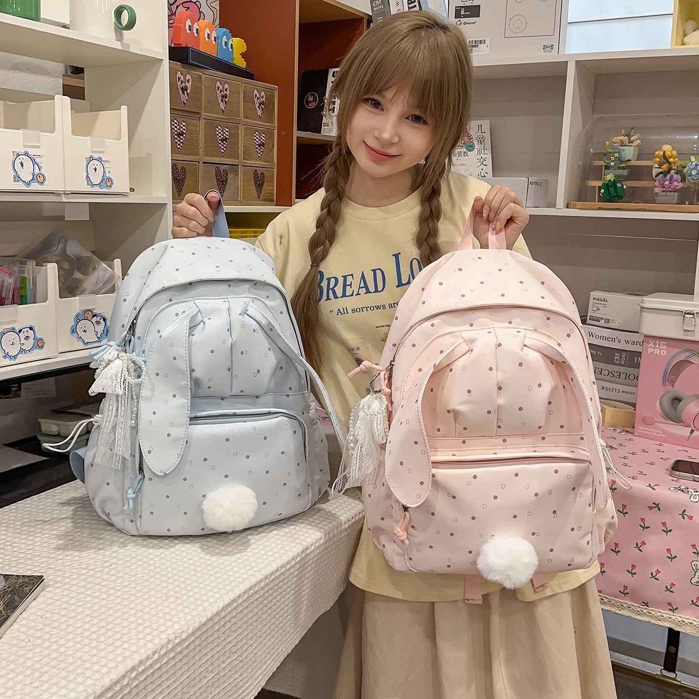 可爱波点双肩包女初高中学生少女风轻便书包时尚兔耳朵小学生背包