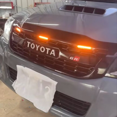 适12-14年海拉克斯HILUX VIGO改装保险杠亮黑色带灯GR标中网装饰