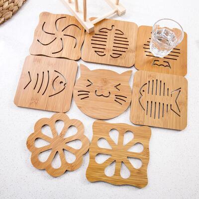 Carved cartoon wooden coasters, heat-insulating pads, kitche