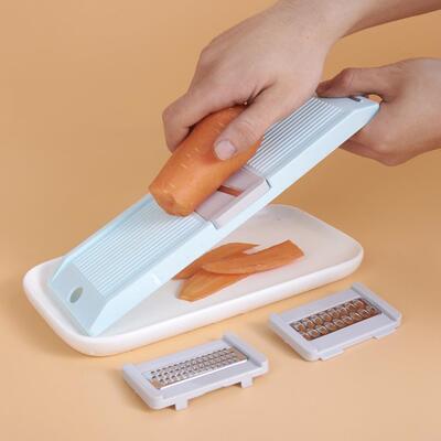Grater, potato slicer, shredder, and kitchen gadget - a mult