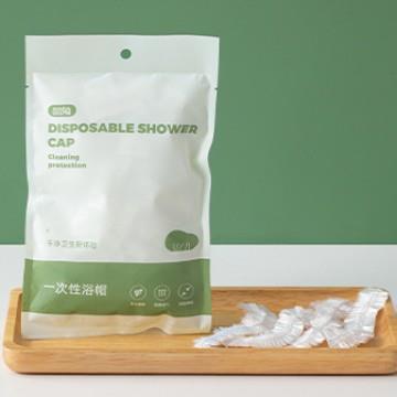 New disposable shower cap with elastic opening, strip-shaped