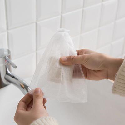 Japanese-style handcrafted soap foaming net with a loop for