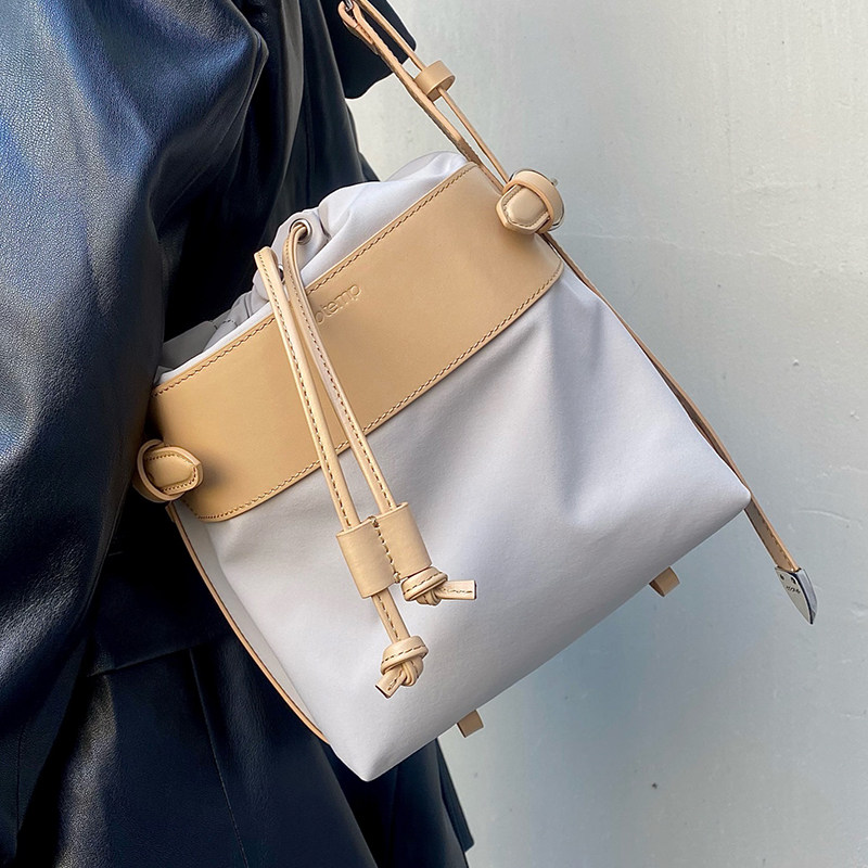 EVENBUYER很会买COTEMP抽绳水桶包小牛皮黑色卡其色单肩斜挎包_虎窝淘