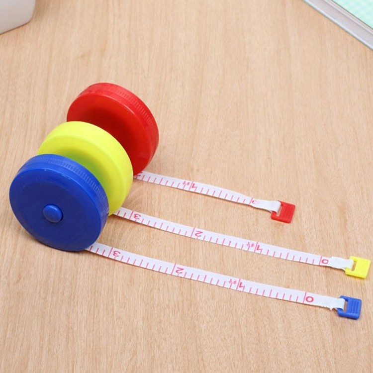 [USD 4.37] Candy-colored mini-bells measure the height of the three ...