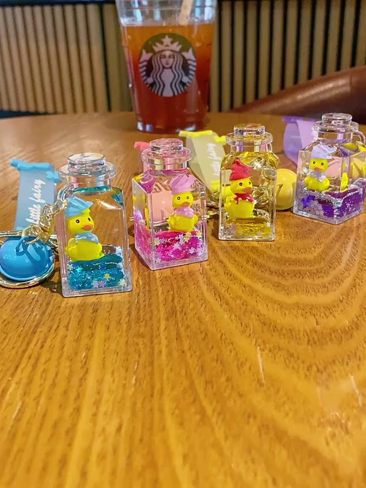 Cartoon Acrylic Floating Into Oil Liquid Quicksand Key Chain Creative ...