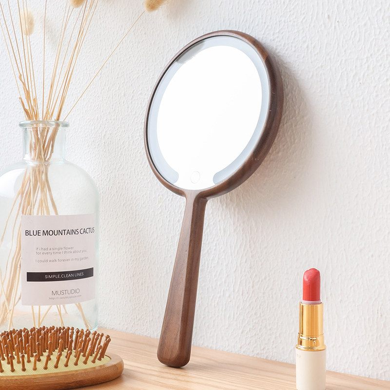 Solid wood makeup mirror: a small blessing for a refined life