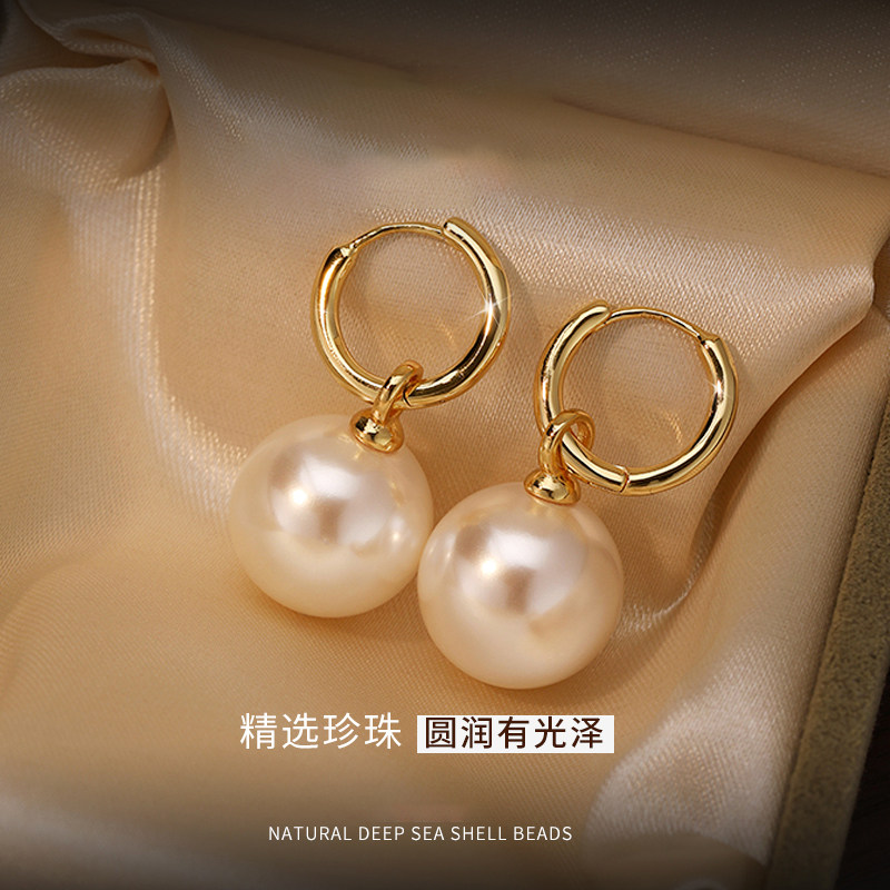 2025's hottest trend | classy key pearl earrings: a unique design ...
