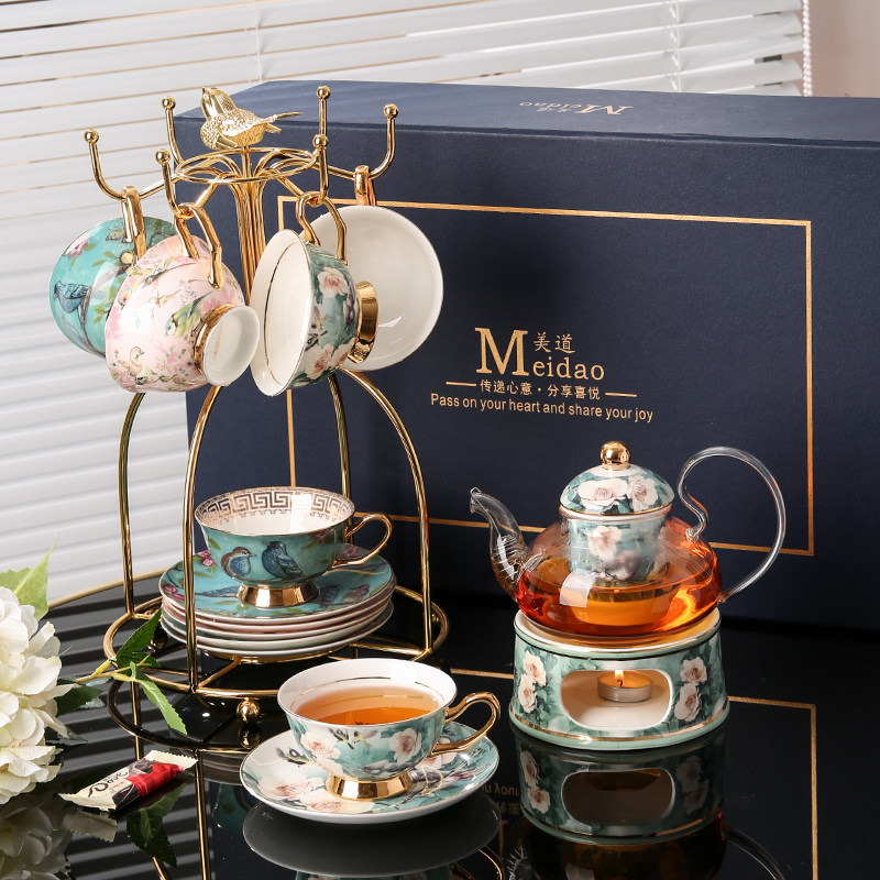 Beautifully decorated glass teapot candle heating tea afternoon tea tea ...