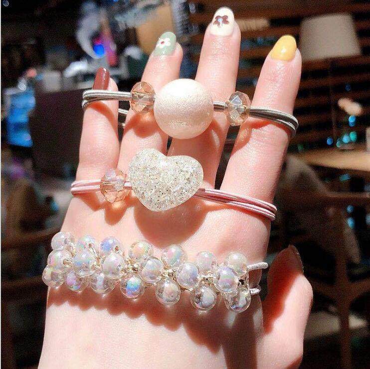 A three - piece set of rope - rope bracelet two in one ball head rope ...