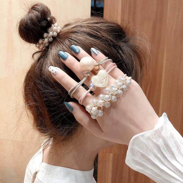 A three - piece set of rope - rope bracelet two in one ball head rope ...
