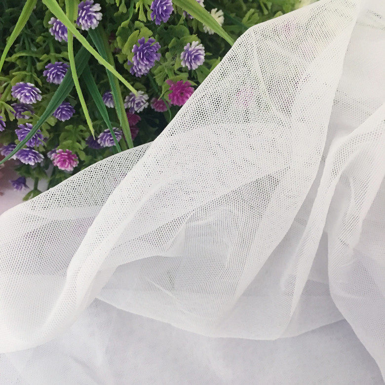 高档透明柔软肤色弹力网纱面料四面弹力网纱布料礼服服装布料里料-阿里巴巴