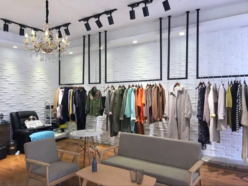 Clothing store display rack upper wall ceiling hanging clothes hanger ...