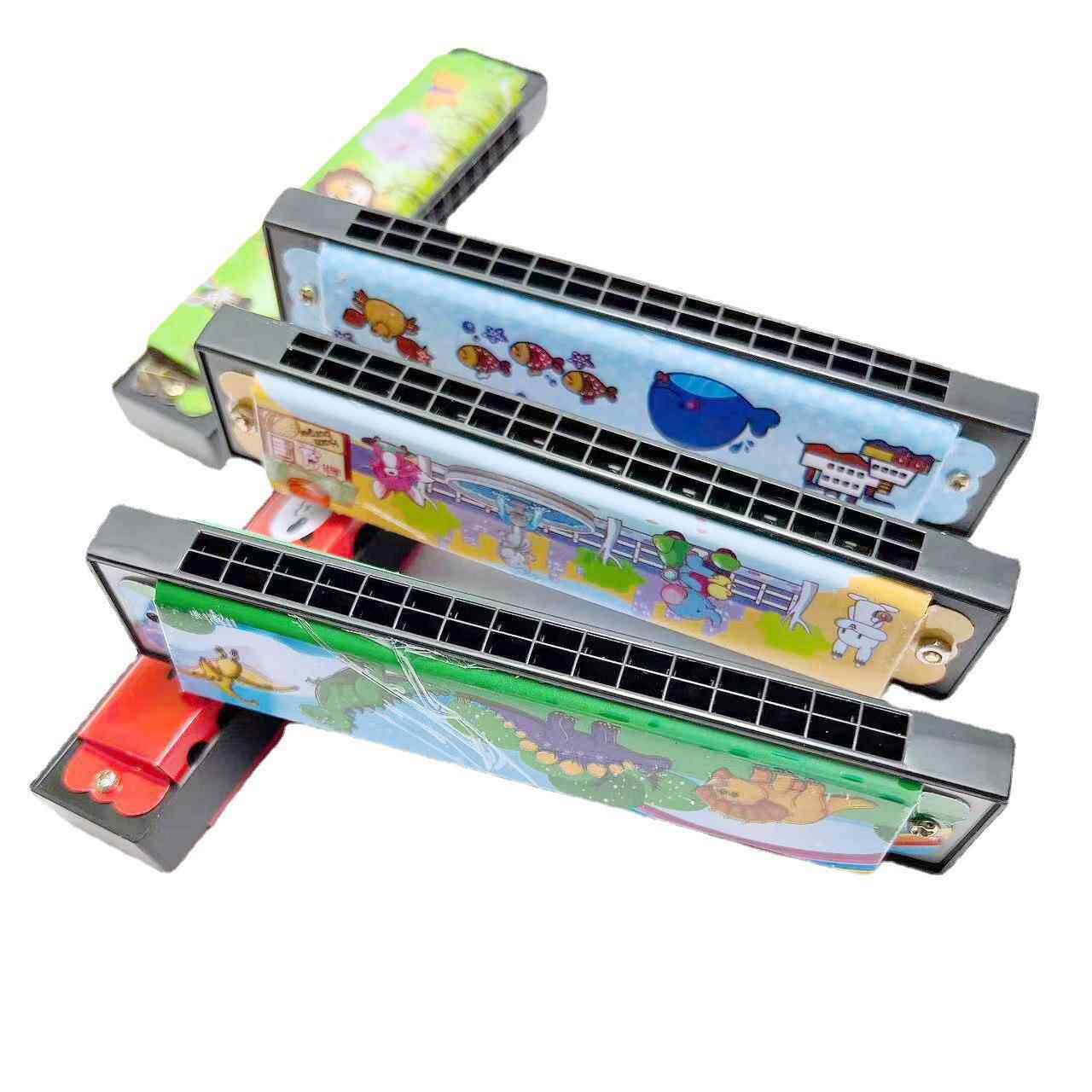 Cartoon tin harmonica: a musical enlightenment tool for babies ...