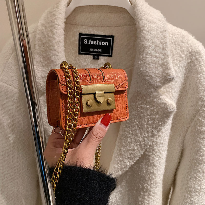 A must-have for your street-style baby! this chain-strap mini square ...