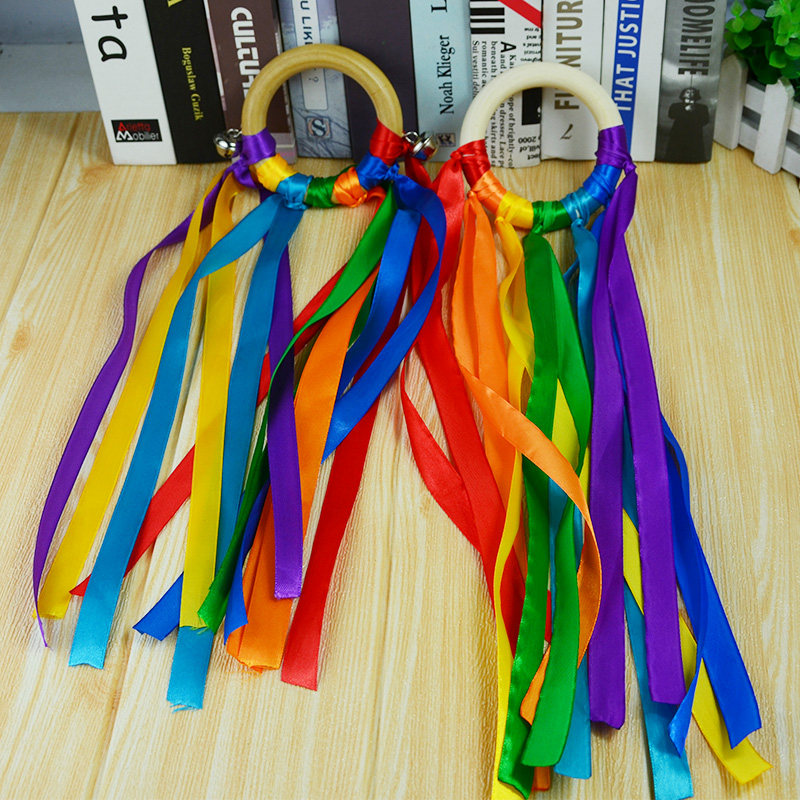 Kindergarten rainbow ribbon dance Wooden ring bell Morning exercise ...