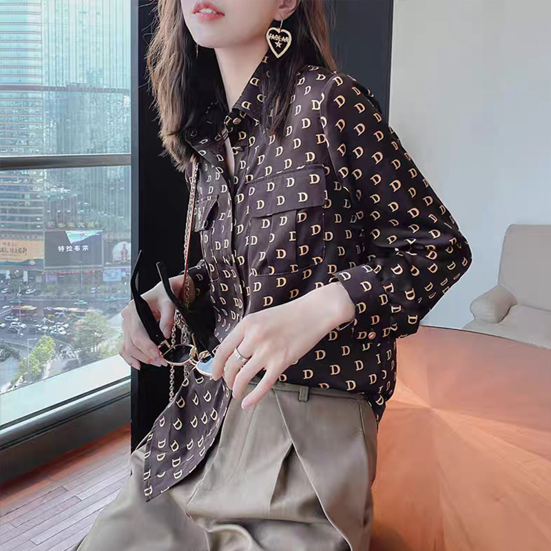 Chic and stylish high-end women's blouse: effortless, designer-style ...