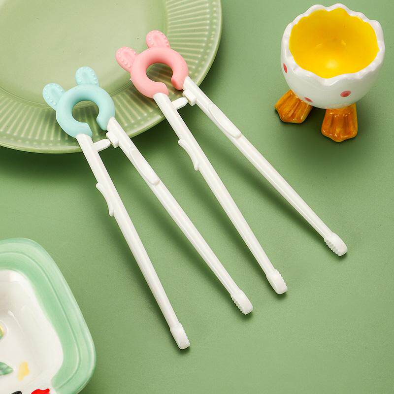 Kids' chopstick trainer with return spring – the perfect training ...