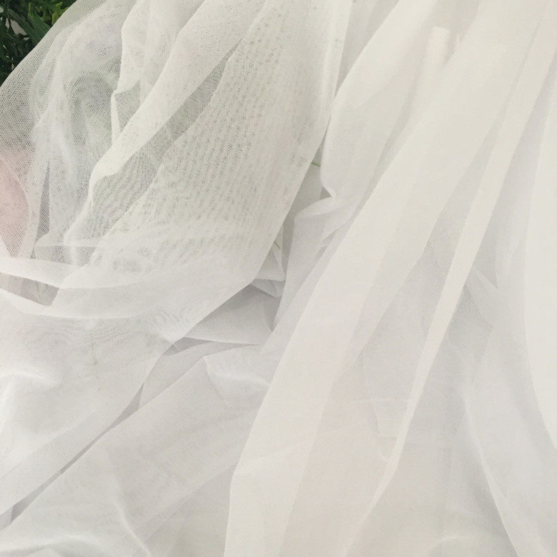 高档透明柔软肤色弹力网纱面料四面弹力网纱布料礼服服装布料里料-阿里巴巴