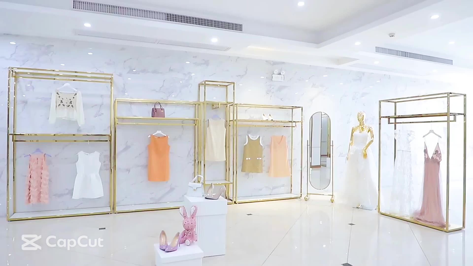 High Quality Shiny Gold Wall Mounted Clothing Display Rack Gold Custom ...