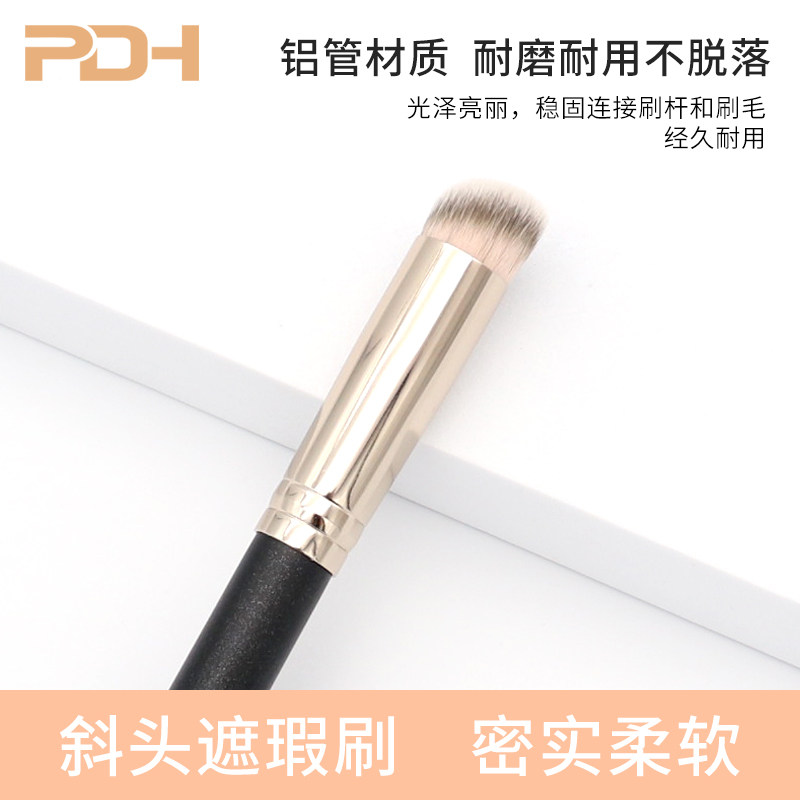 Slanted concealer brush to cover acne marks, spots, dark circles, tear ...